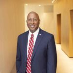 E. Leon Carter – Carter Arnett